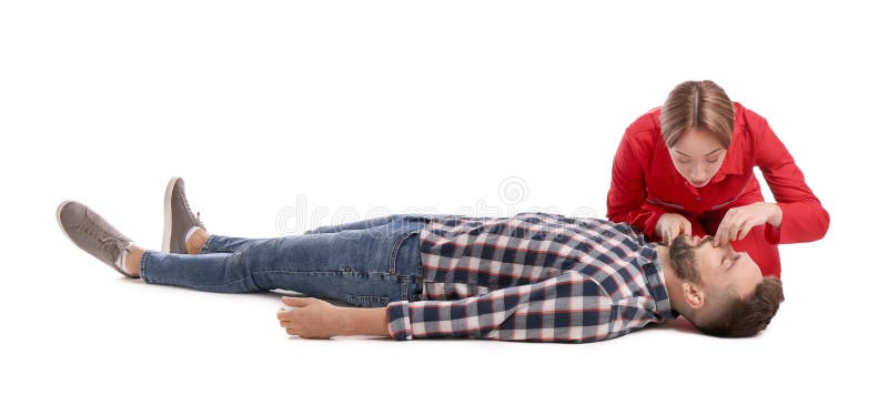 Paramedic in Uniform Performing First Aid on Unconscious Man Against ...