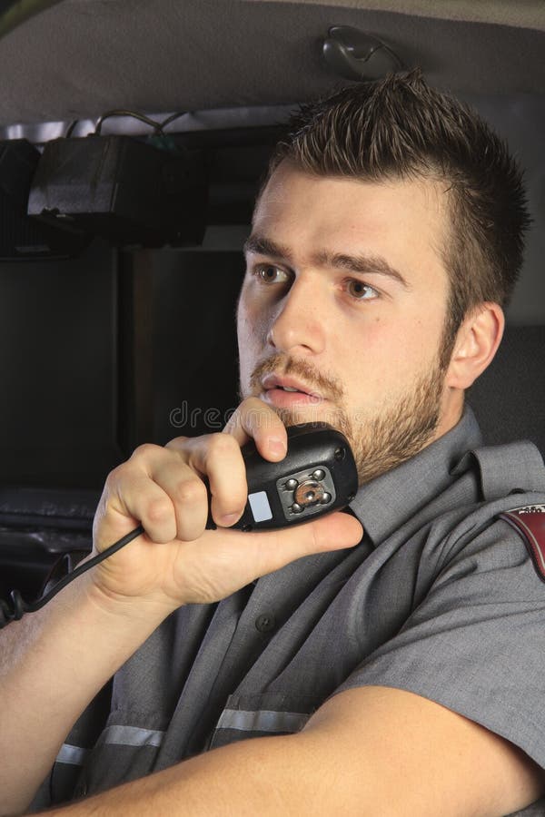 A Paramedic at the Wheel of His Ambulance Stock Photo - Image of ...