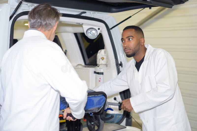 Paramedic Pushing Gurney Stock Photos - Free & Royalty-Free Stock ...