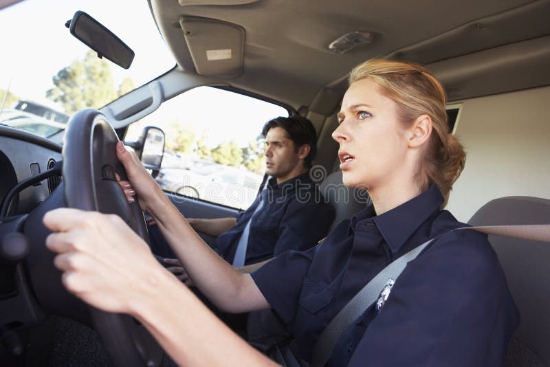 Paramedics Responding To Emergency in Ambulance Stock Image - Image of ...