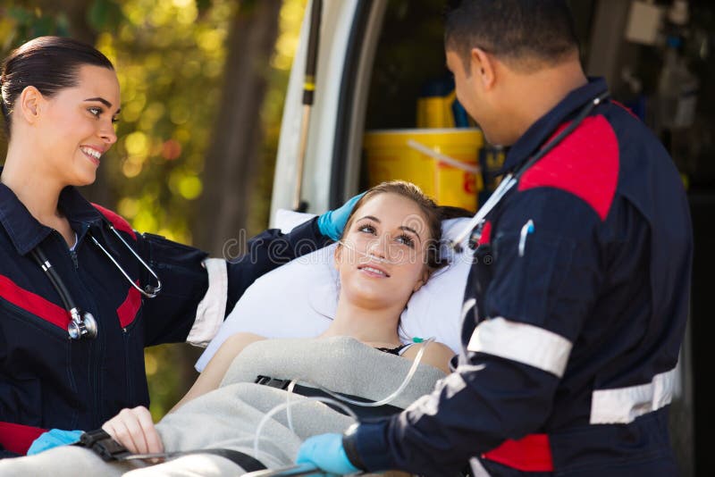 Paramedics talking patient stock photo. Image of medical - 41855346