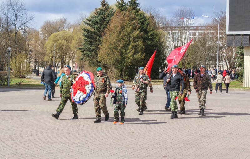 A Paramilitary Group with Flags and a Wreath. Editorial Stock Photo ...
