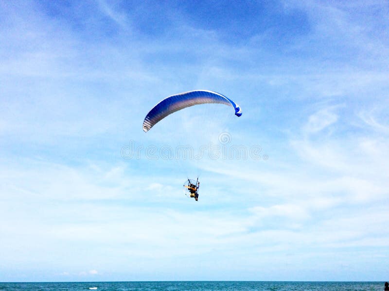 Paramotor Glider Over Ocean Stock Photo - Image of horizon, paraglider ...