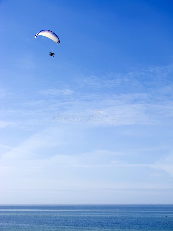 Paramotor Glider Over Ocean Stock Photo - Image of horizon, paraglider ...
