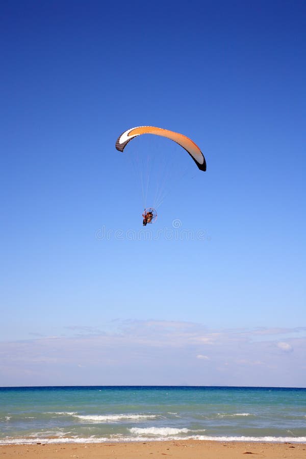 Paramotor Glider Over Ocean Stock Photo - Image of horizon, paraglider ...