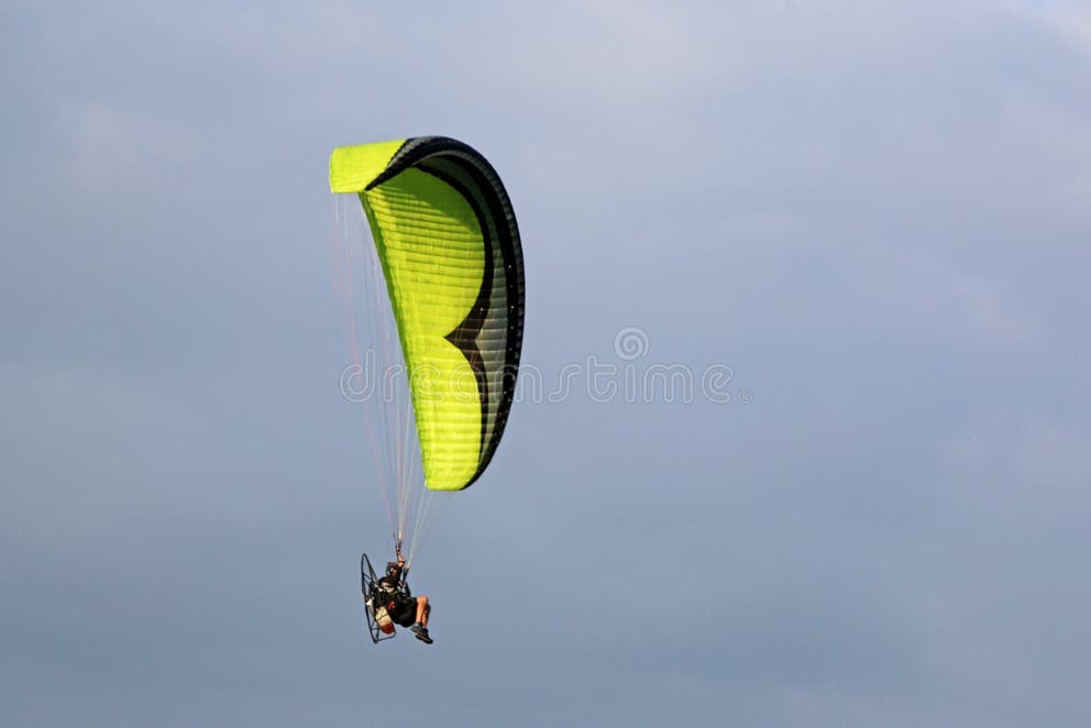 Paramotor Pilot Flying in a Blue Sky Stock Image - Image of extreme, wing: 256949053