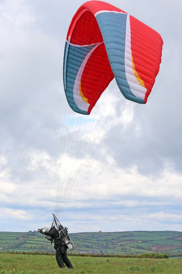 Paramotor Pilot Launching in a Field Stock Photo - Image of lines ...