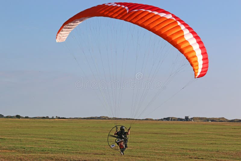 Paramotor Pilot Taking Off from a Field Stock Photo - Image of land ...