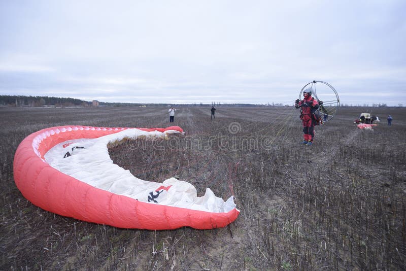 Paramotoring. Paramotorist Checking Rigging for Start To Fly Editorial ...