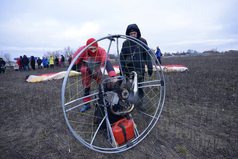 Paramotoring. Paramotorist Men Checking Equipment of Paramotor for ...