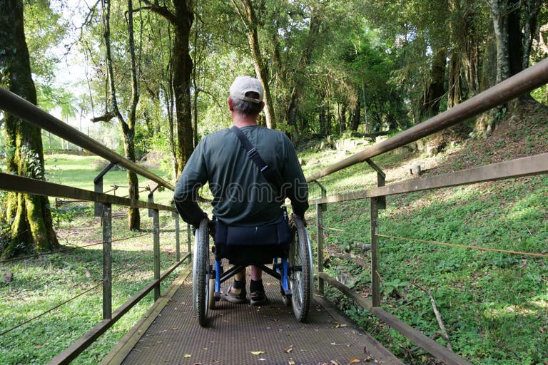 Paraplegic Using Ramp Made for Wheelchair Users in Park Stock Photo ...