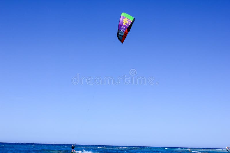 Parasail on blue sky editorial photography. Image of people - 71743952