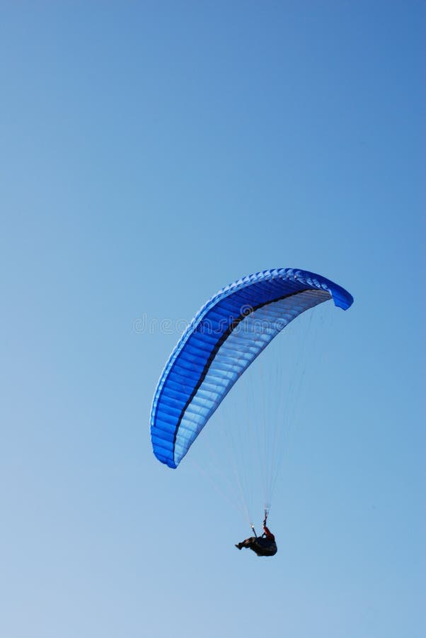 Parasailer stock photo. Image of silhouette, blue, high - 12074308