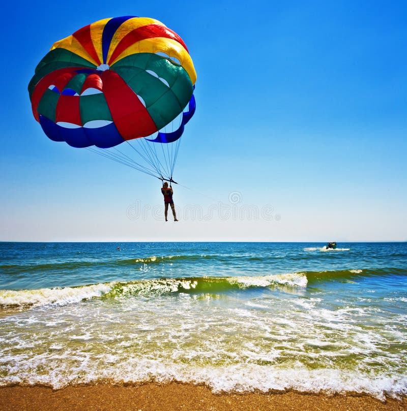 Parasailer over ocean stock image. Image of flying, parasailer - 5236087