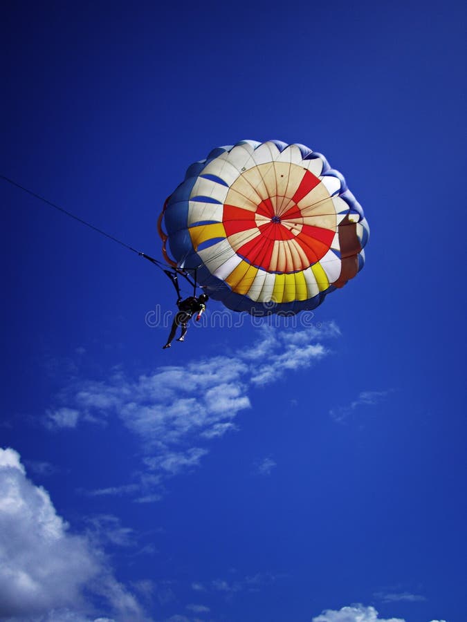 Parasailing Above the Blue Sky Stock Image - Image of bali, aircraft ...