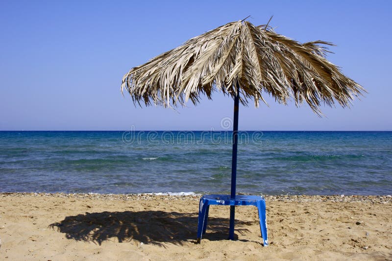 Parasol on the beach stock image. Image of umbrella, palm - 22457965