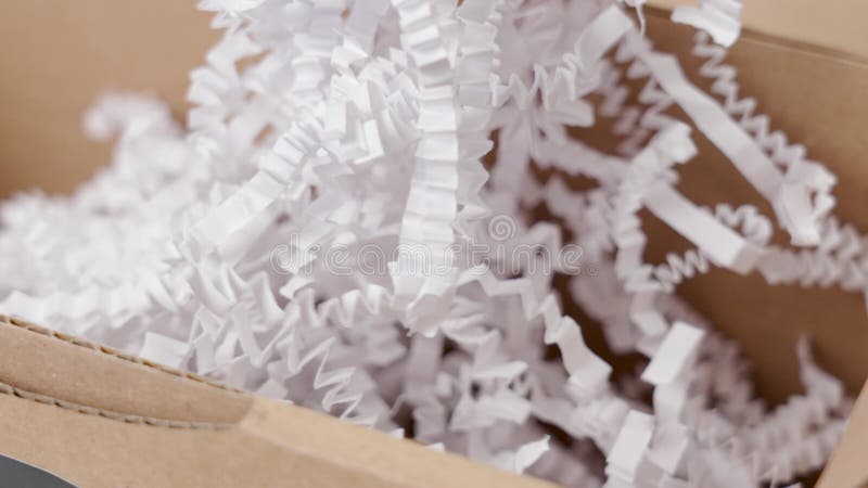 Parcel Box with White Shredded Plastic Filler Stock Video - Video of ...