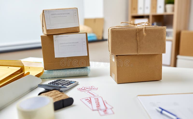 Parcel Boxes on Table at Post Office Stock Photo - Image of post ...