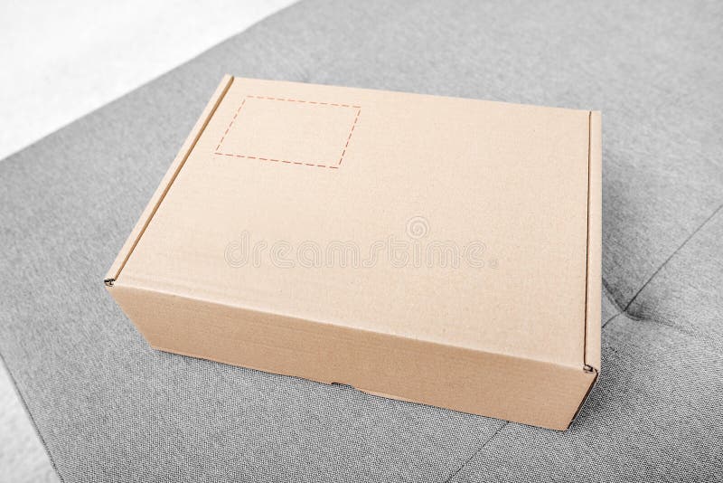 Parcel. Cardboard Box in the Interior. Stock Image - Image of beige ...