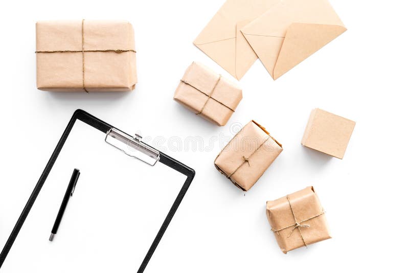 Parcel Delivery Concept. Wrapped Boxes and Pad on Whote Backgroyund Top ...