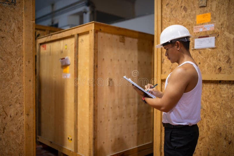 Employees are Checking Parcel Boxes in a Large Warehouse Stock Photo ...