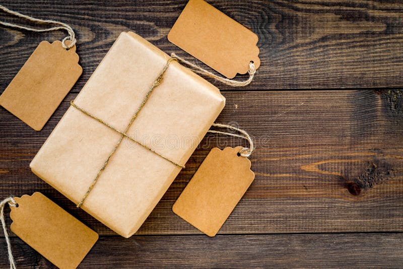 Parcel Packaging Box Wrapped with Craft Paper with Empty Label Mockup ...
