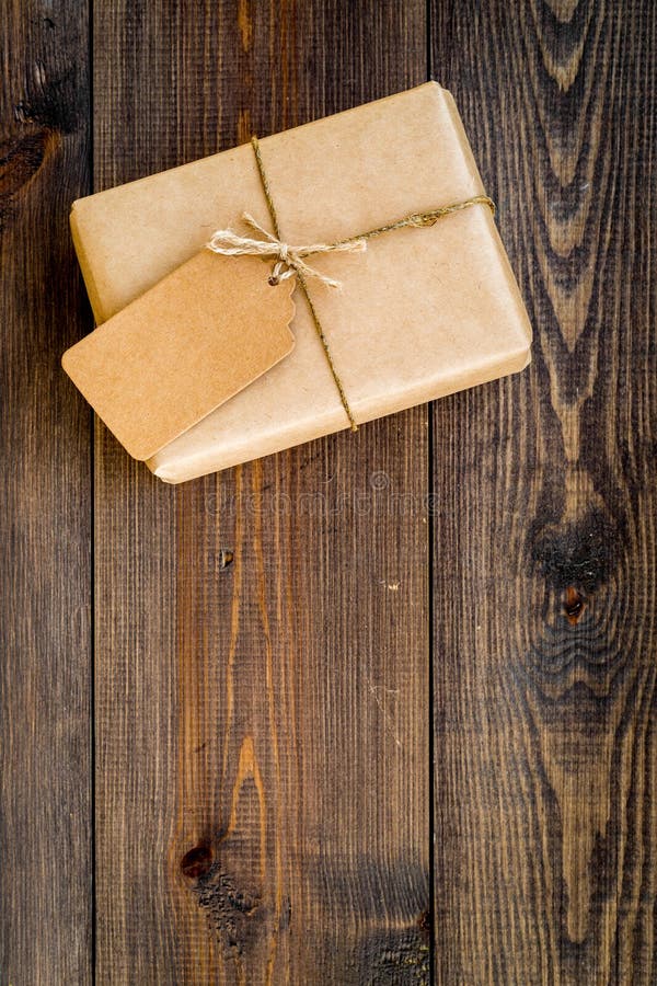 Parcel Packaging Box Wrapped With Craft Paper With Empty Label Mockup ...