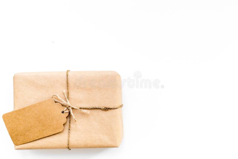 Parcel Packaging Box Wrapped with Craft Paper with Empty Label Mockup ...