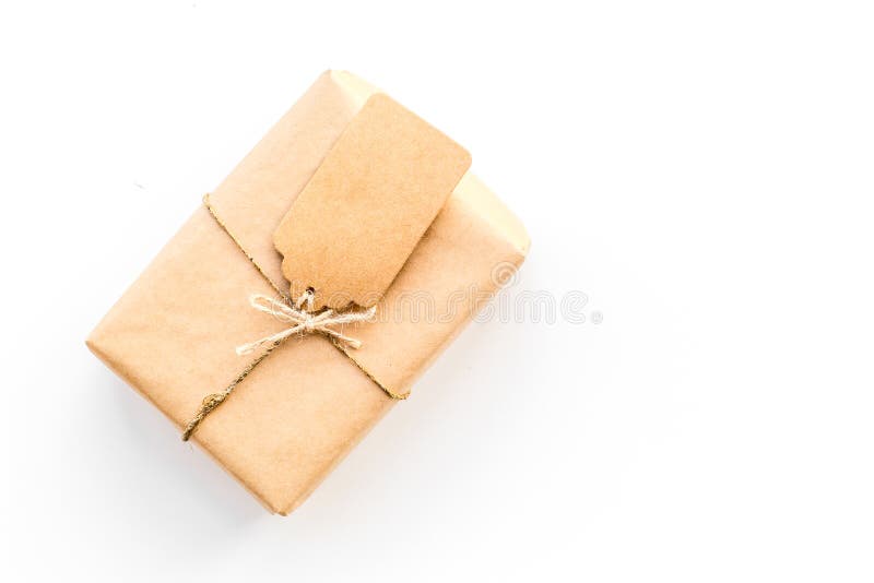 Parcel Packaging Box Wrapped with Craft Paper with Empty Label Mockup ...
