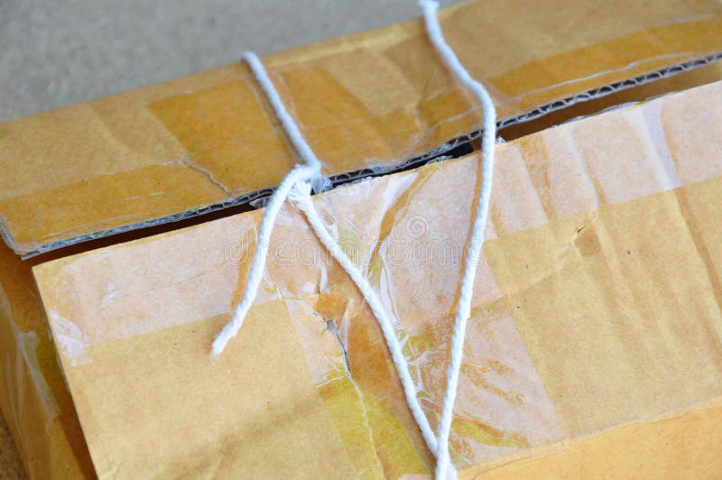 Parcel Rope Cut and Open Brown Postal Box Stock Image - Image of tied ...