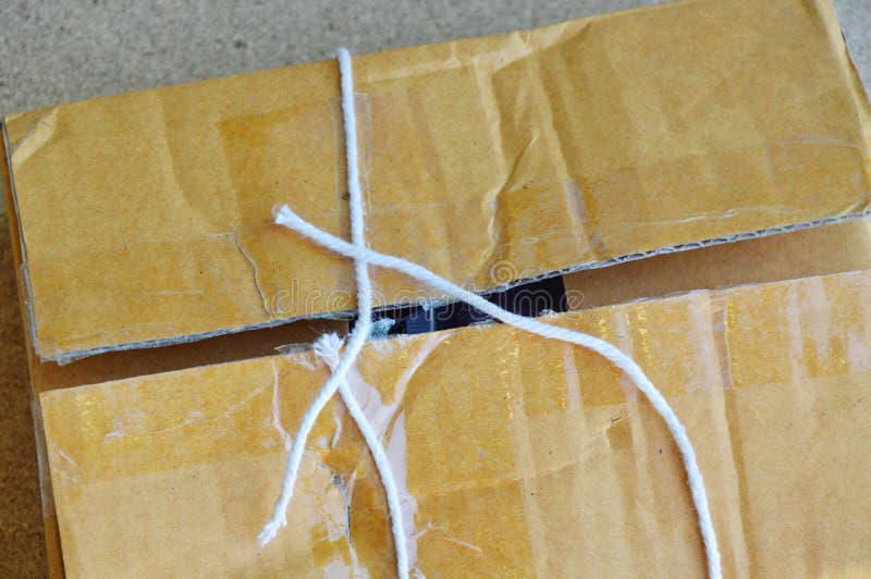 Parcel Rope Cut and Open Brown Postbox Stock Image - Image of open ...