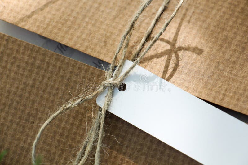 Parcel tied with label stock photo. Image of brown, copy - 73160142