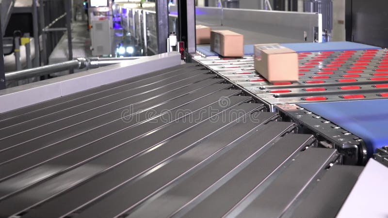 Parcels and Foil Bags on Conveyors Stock Video - Video of processing ...
