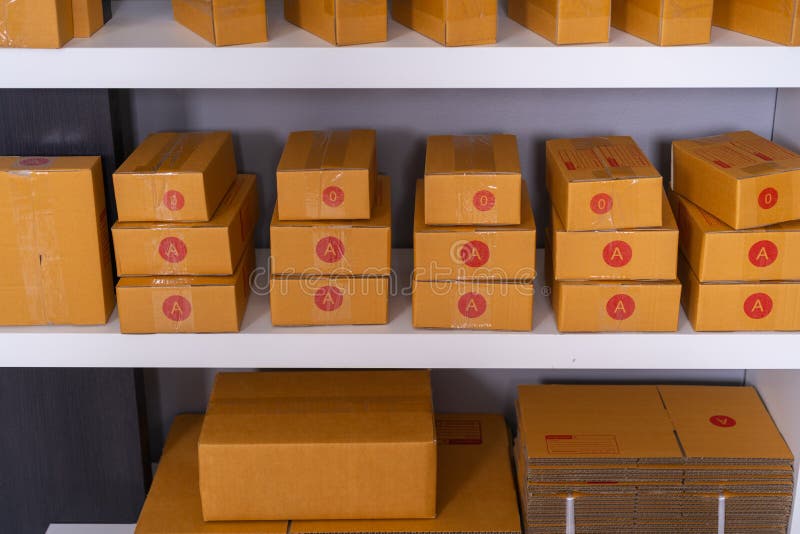 Parcels on Shelf Ready for Shipment To Client in Home Office Stock ...