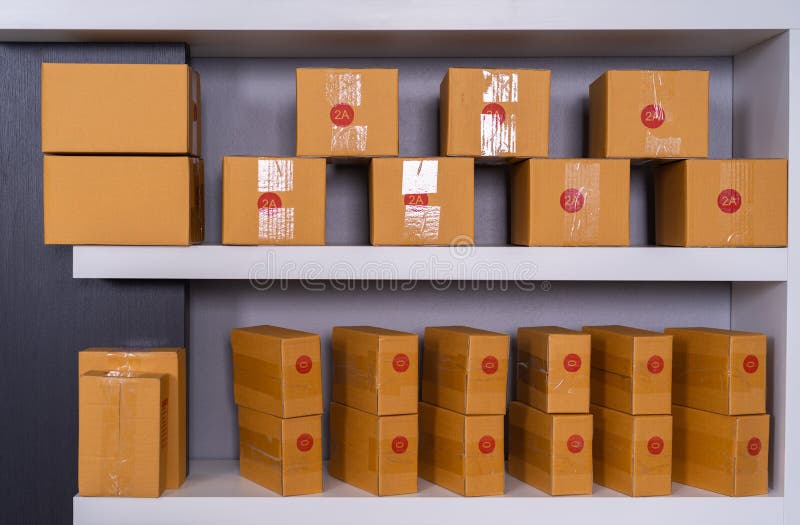Parcels on Shelf Ready for Shipment To Client in Home Office Stock ...