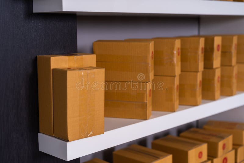 Parcels on Shelf Ready for Shipment To Client in Home Office Stock ...