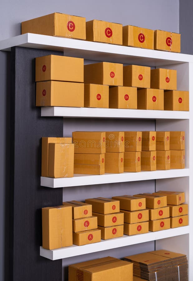 Parcels on Shelf Ready for Shipment To Client in Home Office Stock ...