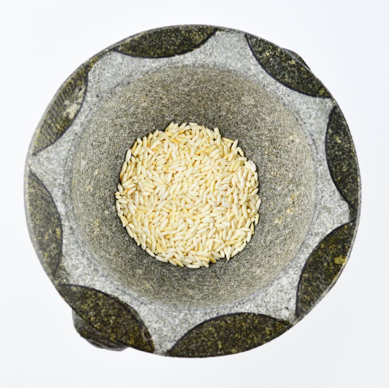 Parched rice in a mortar stock photo. Image of garnish - 31851404