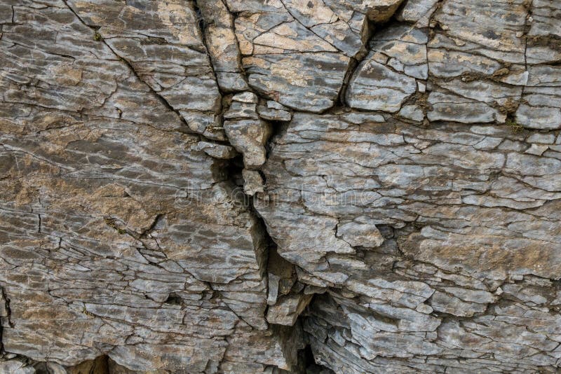 Pared De Piedra De La Roca Con Las Grietas Foto de archivo - Imagen de ...