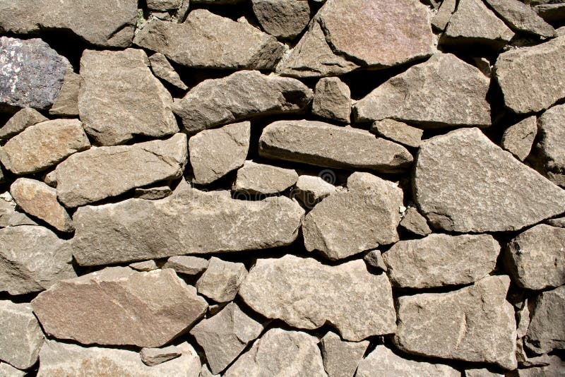 Pared de piedra foto de archivo. Imagen de roca, canario - 3768104