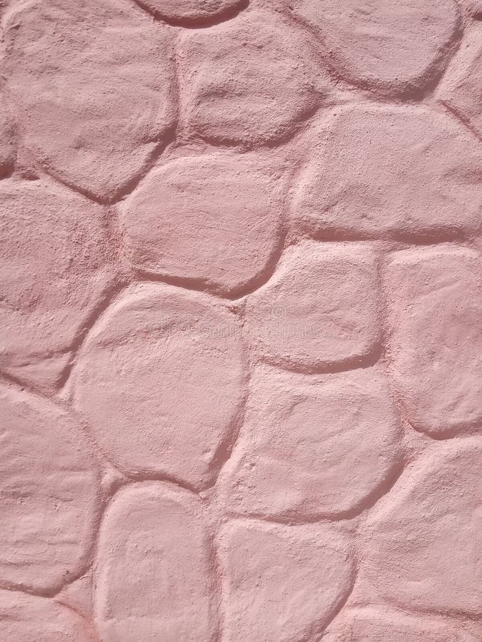 Parede Cor De Rosa De Cimento Em Grandes Pedras Fundo De Gesso Foto De