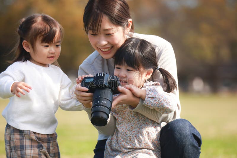 Parent and Child Viewing the Captured Image Stock Image - Image of ...