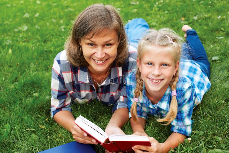 Parent and Child Reading Books Together Stock Photo - Image of laughing ... Parent and Child Reading Books Together Stock Photo - Image of laughing ...