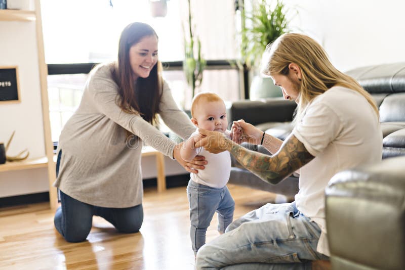 Parent Help a Child To Do the First Steps Stock Image - Image of ...