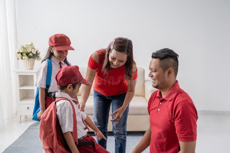 Parent Help Their Children Getting Ready for School Stock Image - Image ...