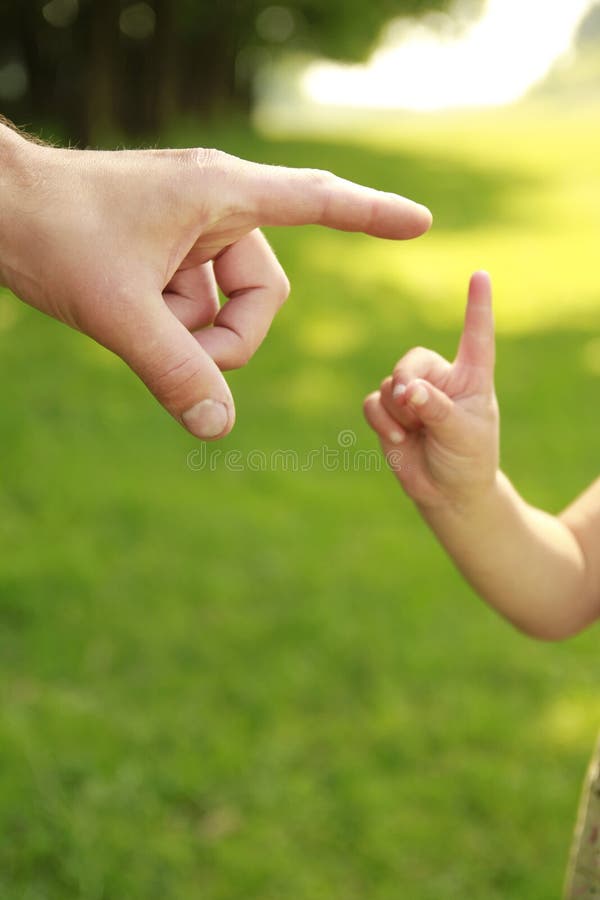 Parent Holds the Hand of a Small Child Stock Photo - Image of fingers ...