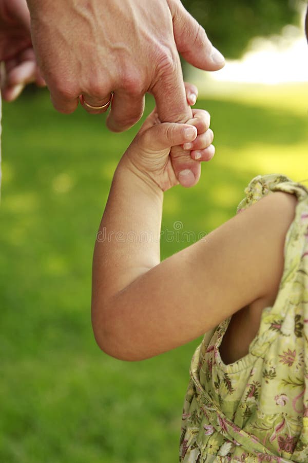 Parent Holds the Hand of a Small Child Stock Image - Image of hero ...