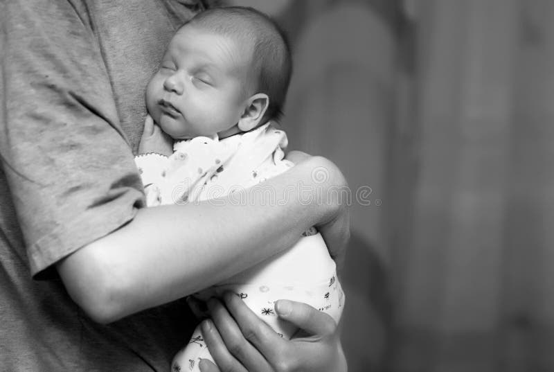 Parent Hugging a Baby Who Sleeps Stock Photo - Image of infant, baby ...