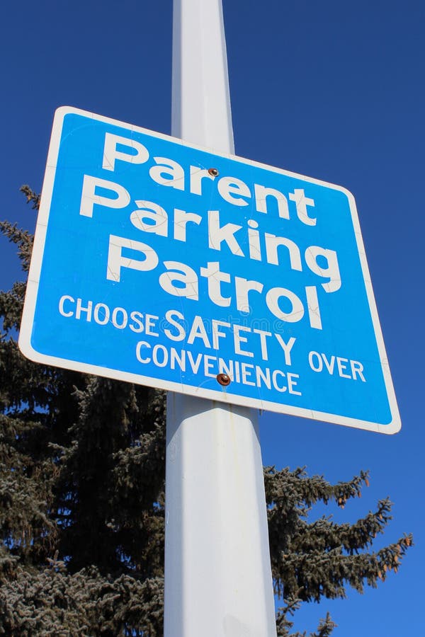 Parent Parking Patrol Sign Against Tree and Blue Sky Stock Image ...