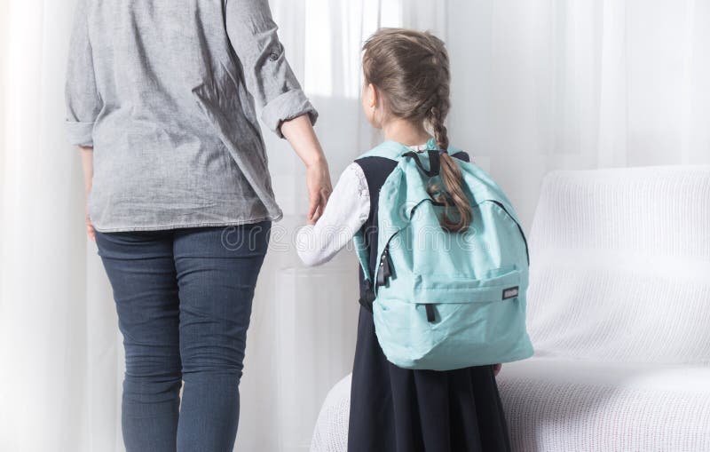Parent and Primary School Student Go Hand in Hand Stock Photo - Image ...